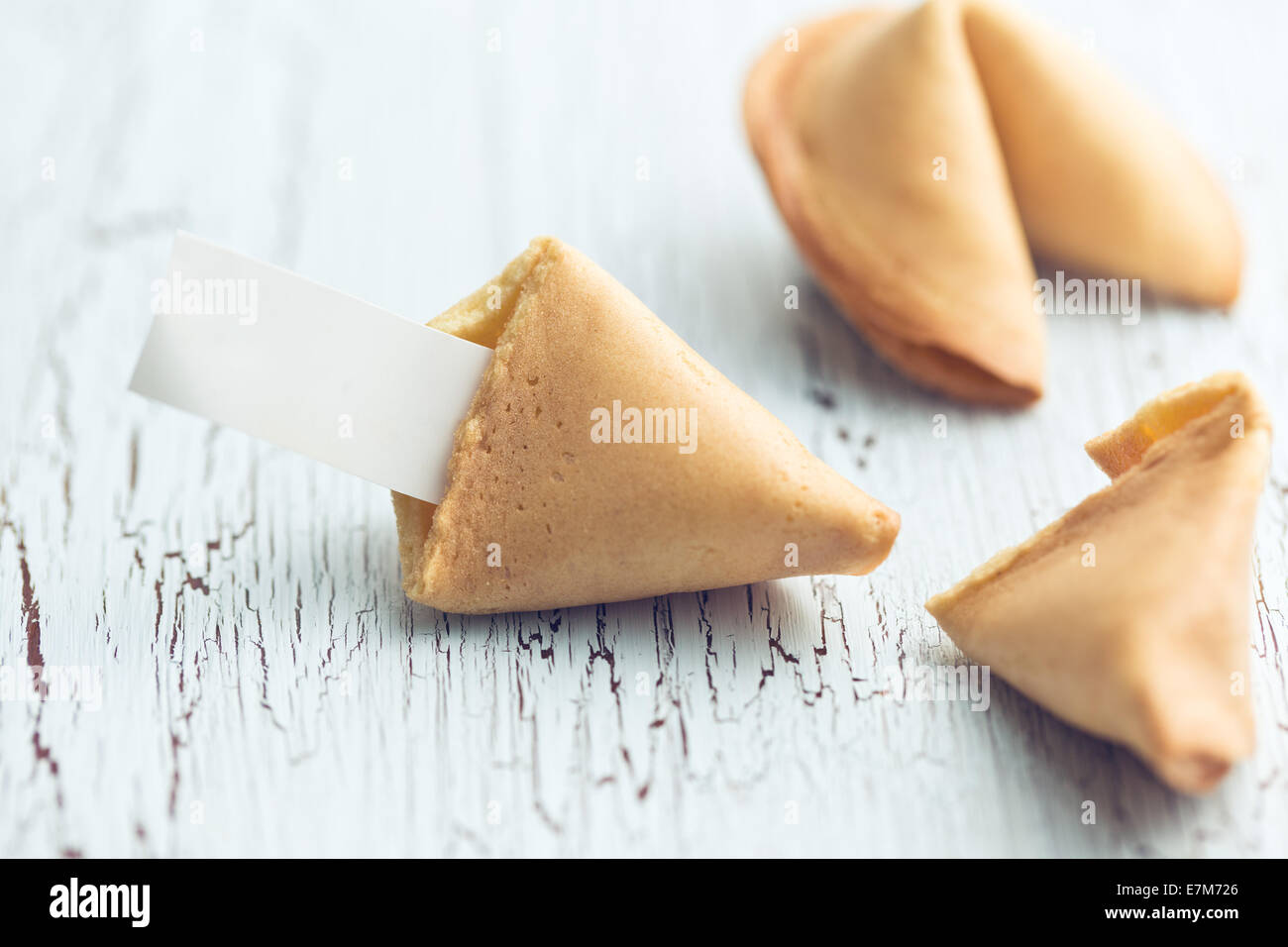 the fortune cookie on the cracked table Stock Photo - Alamy