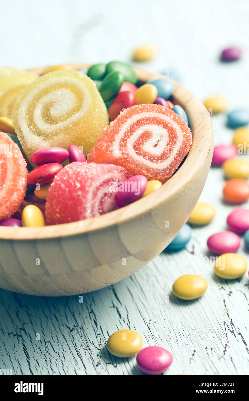 colorful candy in wooden bowl Stock Photo - Alamy