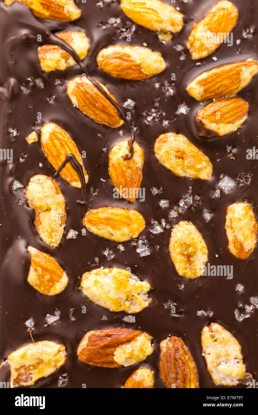 Gourmet almighty almond chocolate bar with sea salt on a white ...