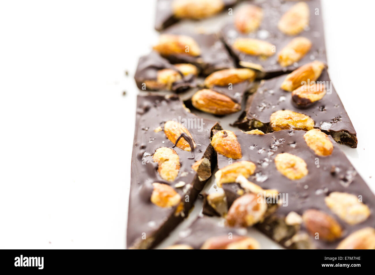 Gourmet almighty almond chocolate bar with sea salt on a white ...