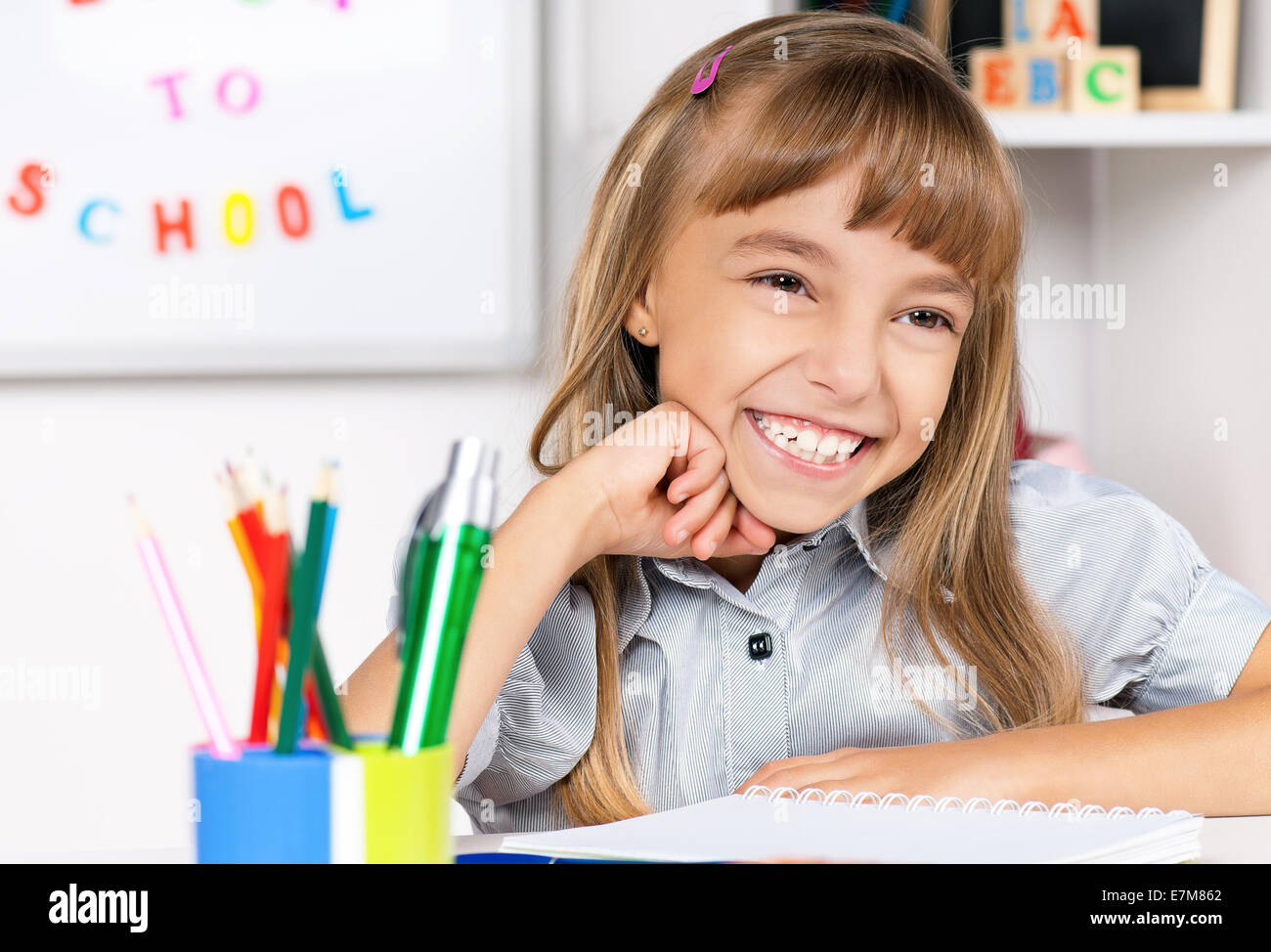 Girl doing homework Stock Photo - Alamy