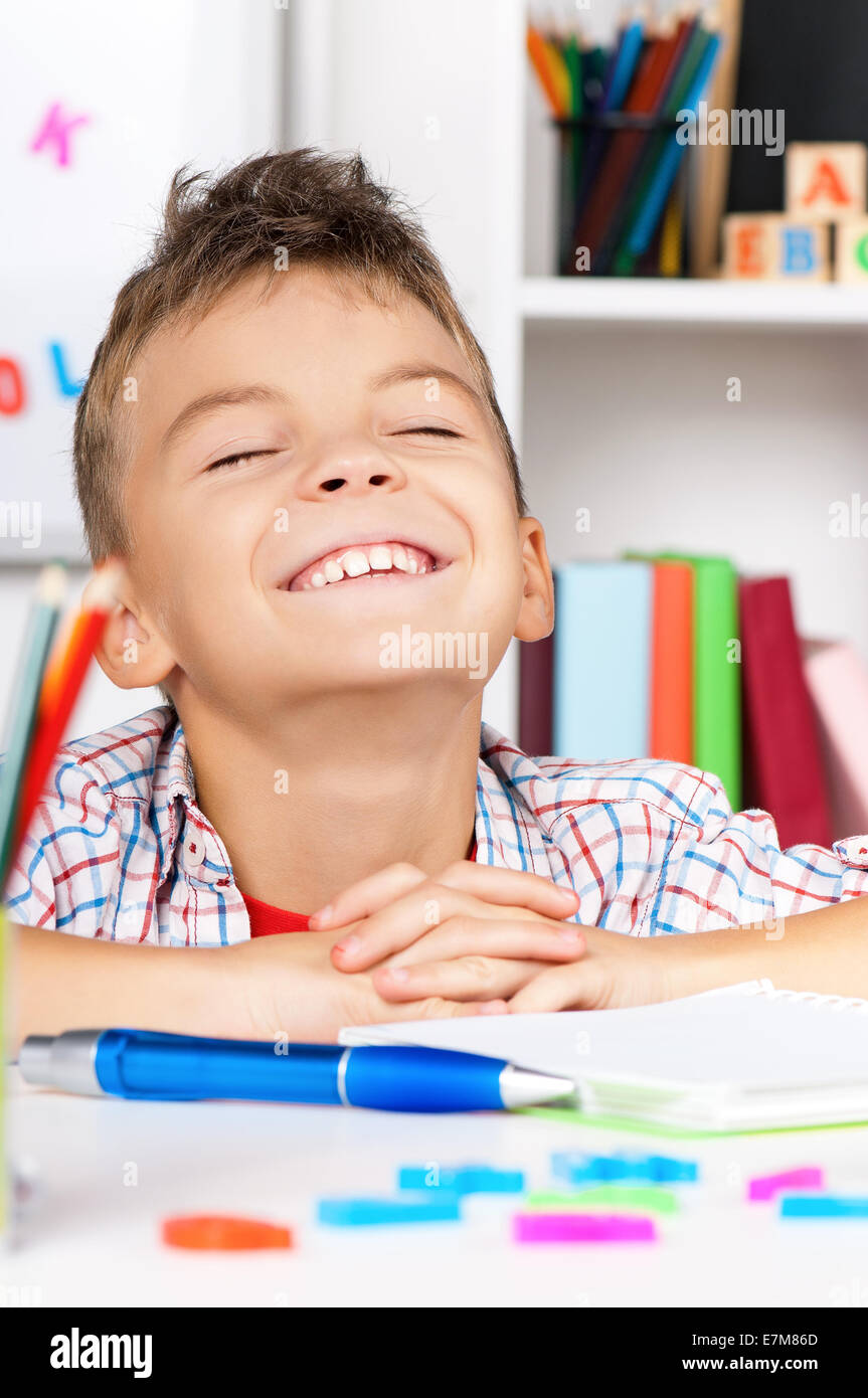 Boy doing homework Stock Photo - Alamy