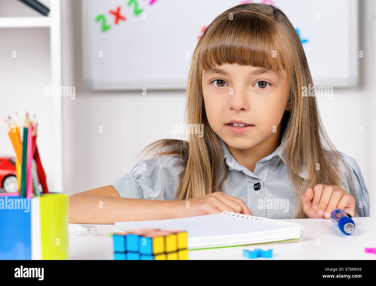 Girl doing homework Stock Photo - Alamy