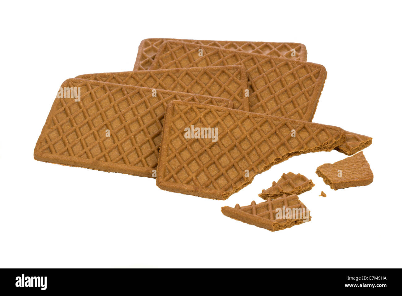 Broken cracker biscuits isolated on white background Stock Photo - Alamy