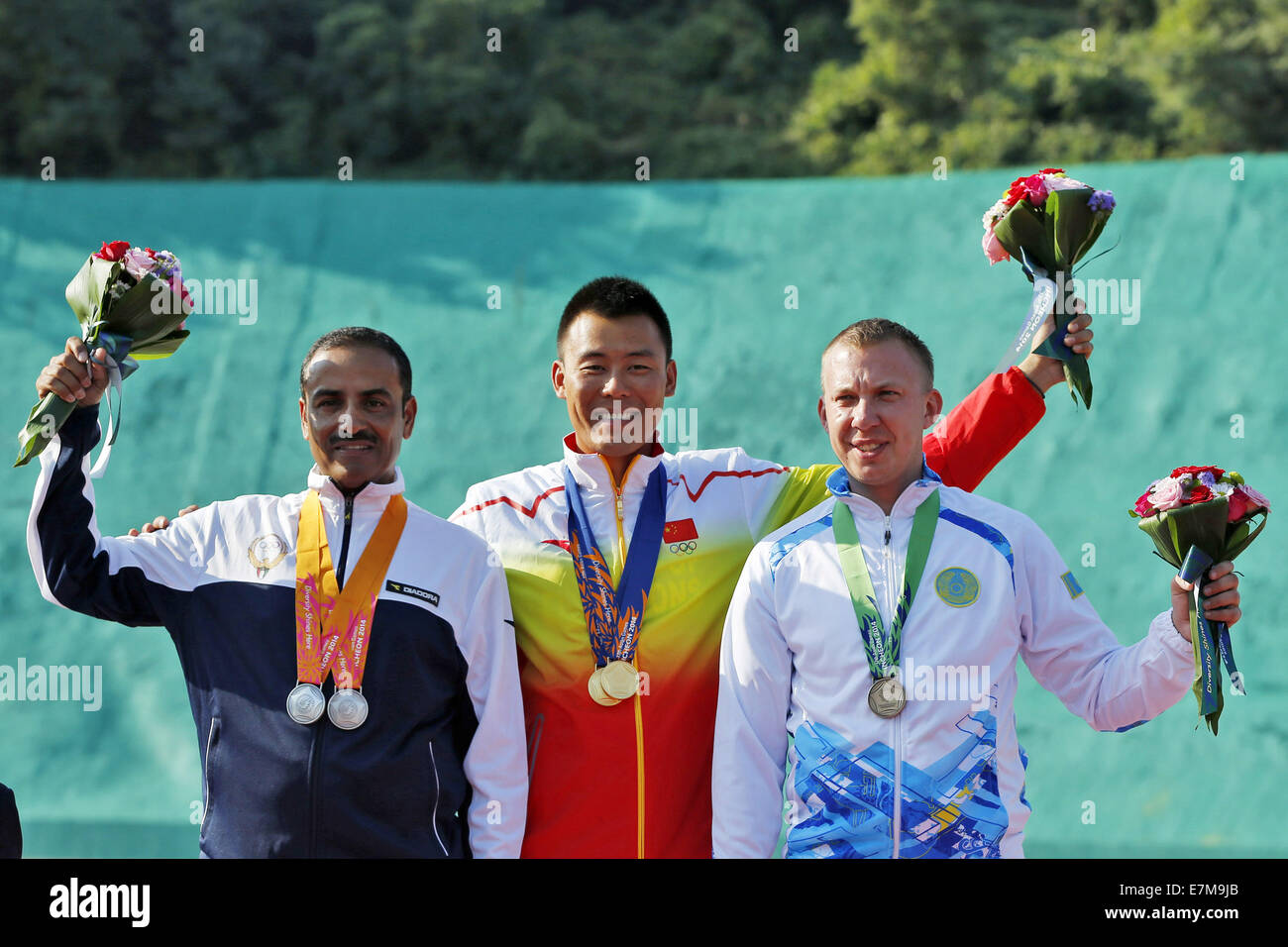 Incheon, South Korea. 21st Sep, 2014. Gold medalist Gao Bo (C) of China ...