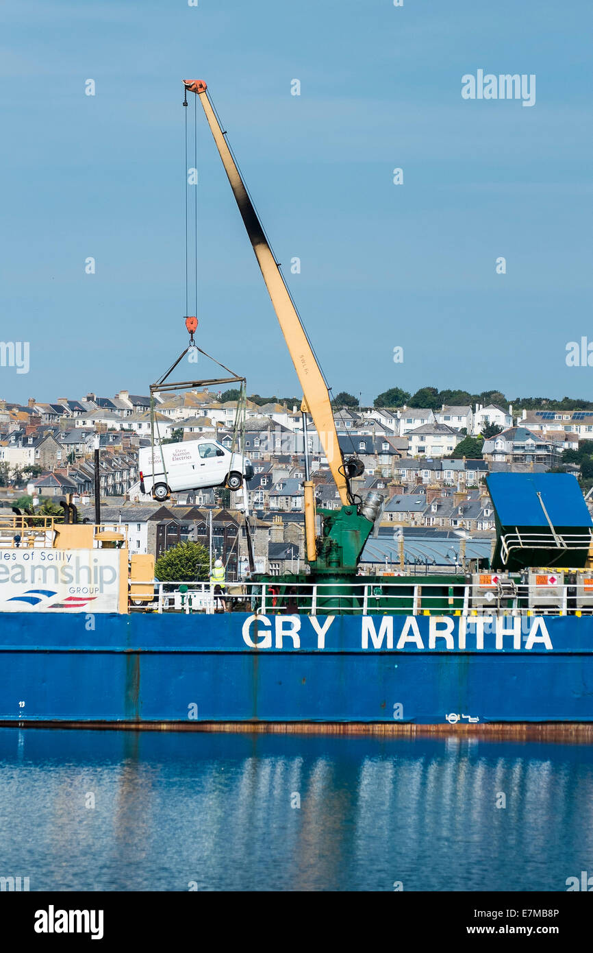 A vehicle being loaded onto the Gry Maritha, the supply ship for the ...