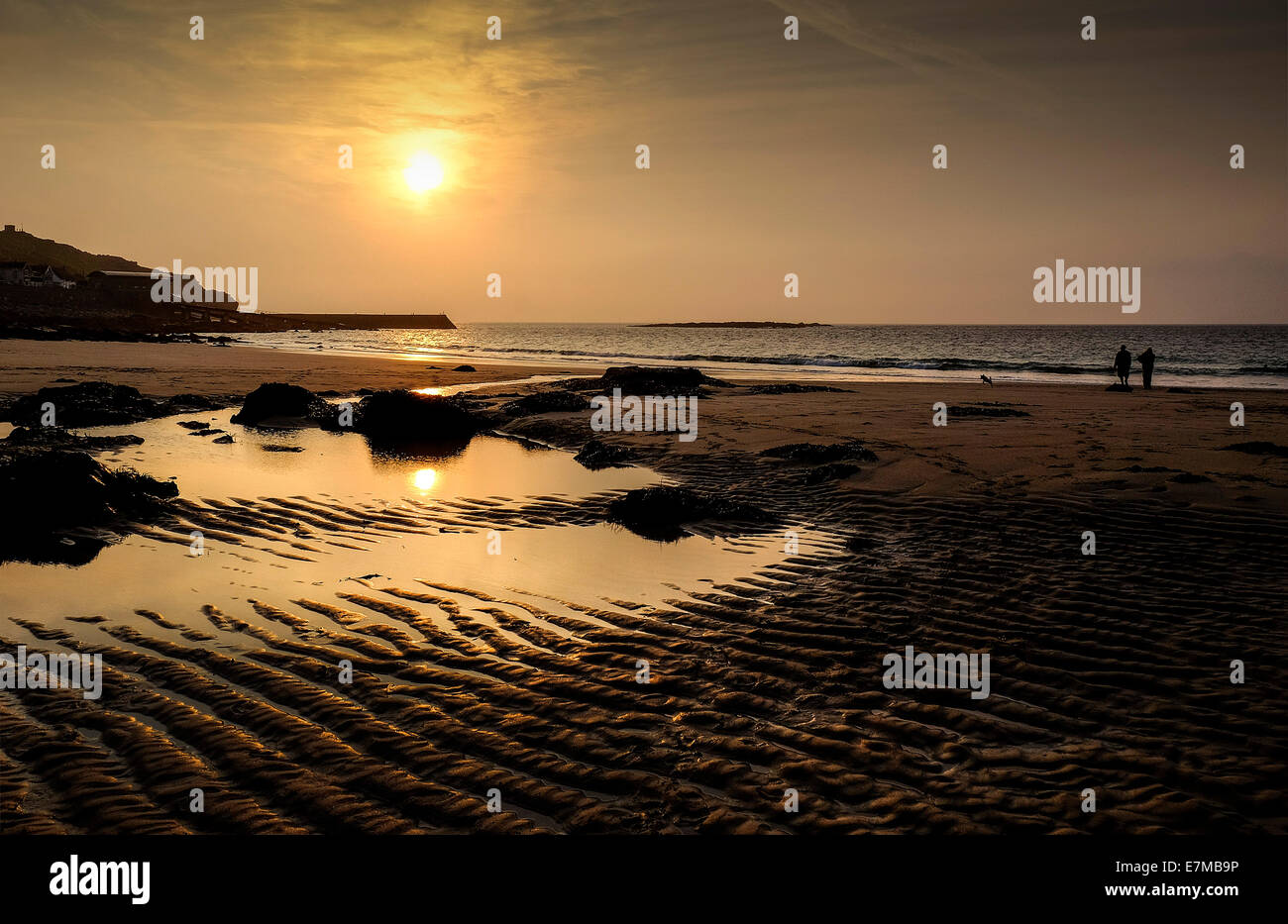 An intense sunset over Sennen Cove in Cornwall Stock Photo - Alamy