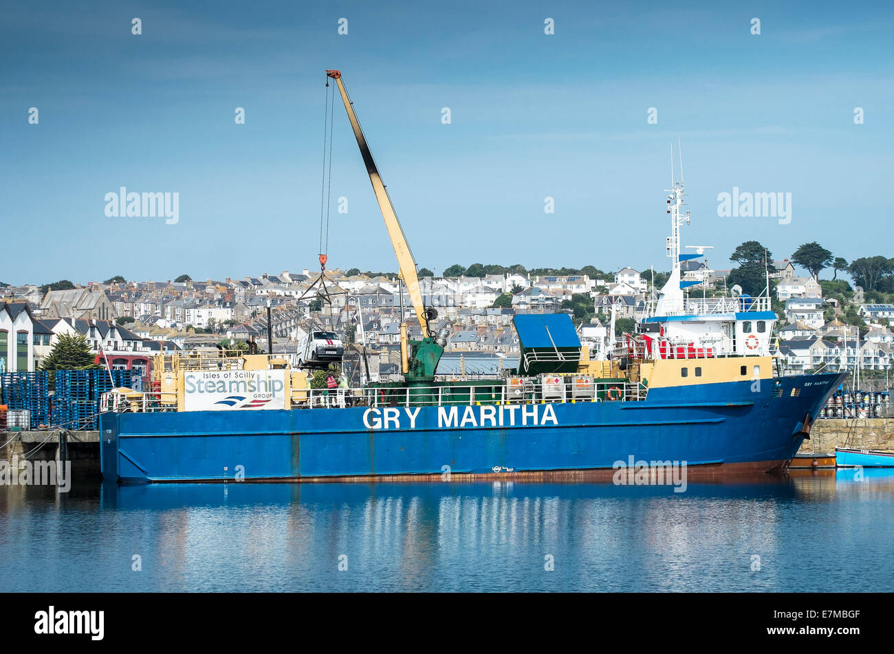 Cargo being loaded onto the Gry Maritha, the supply ship for the Isles ...