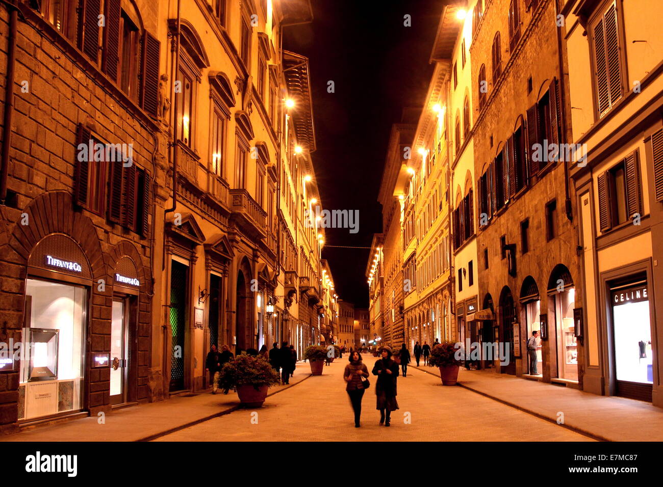 Shopping street scene at night in Firenze Stock Photo - Alamy