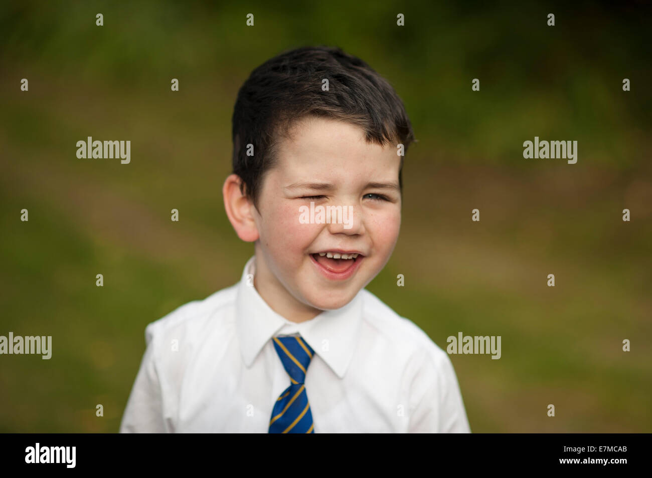 Cheeky smile. School Tie Stock Photo - Alamy