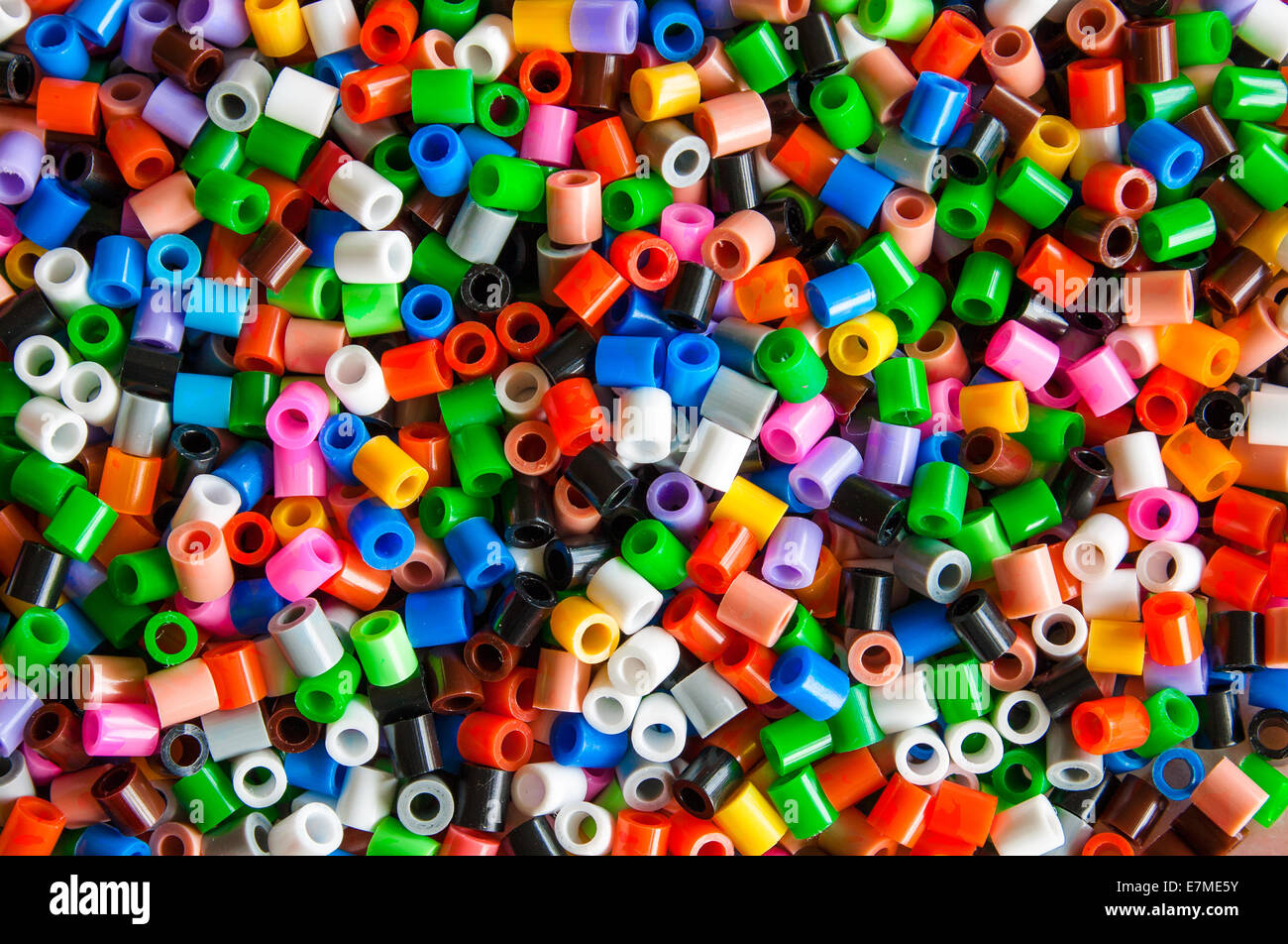 multicolored plastic hama beads toy for kids Stock Photo - Alamy