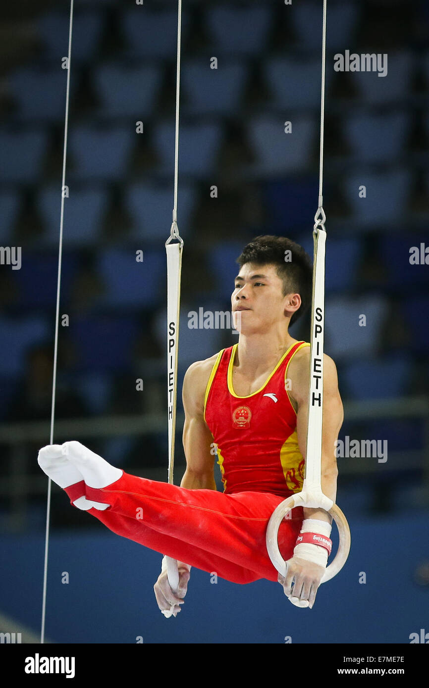 Incheon, South Korea. 21st Sep, 2014. Liao Junlin of China competes ...