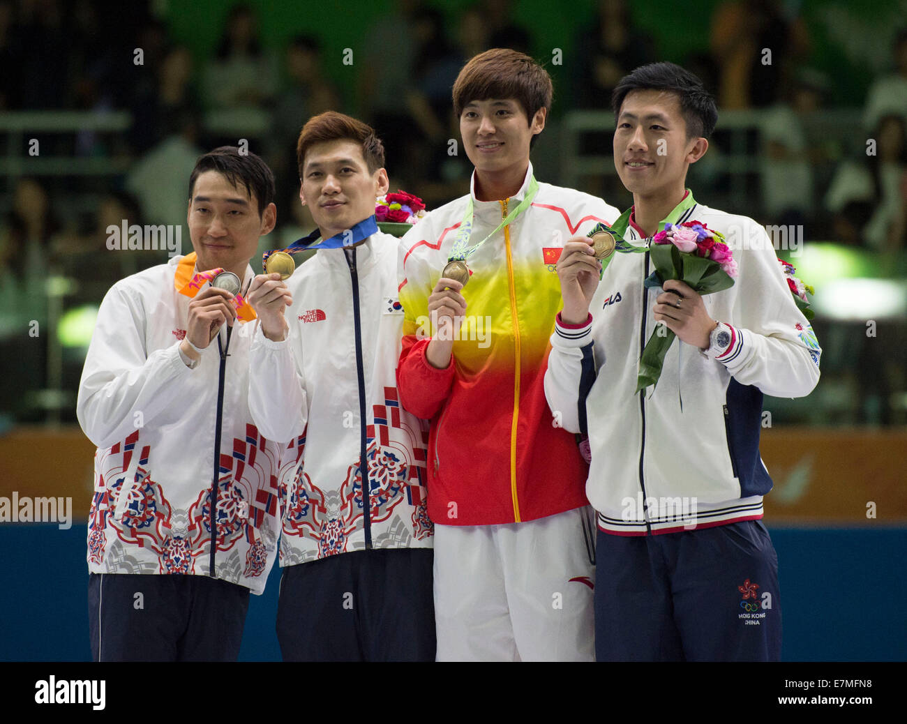 Incheon, South Korea. 21st Sep, 2014. Sun Wei of China (2nd R) poses on ...