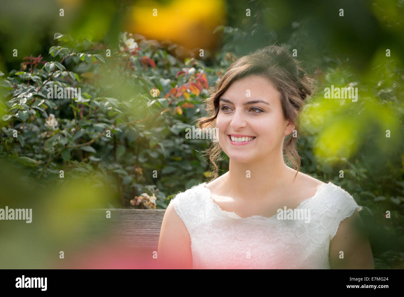 A bride smiling on her wedding day Stock Photo - Alamy