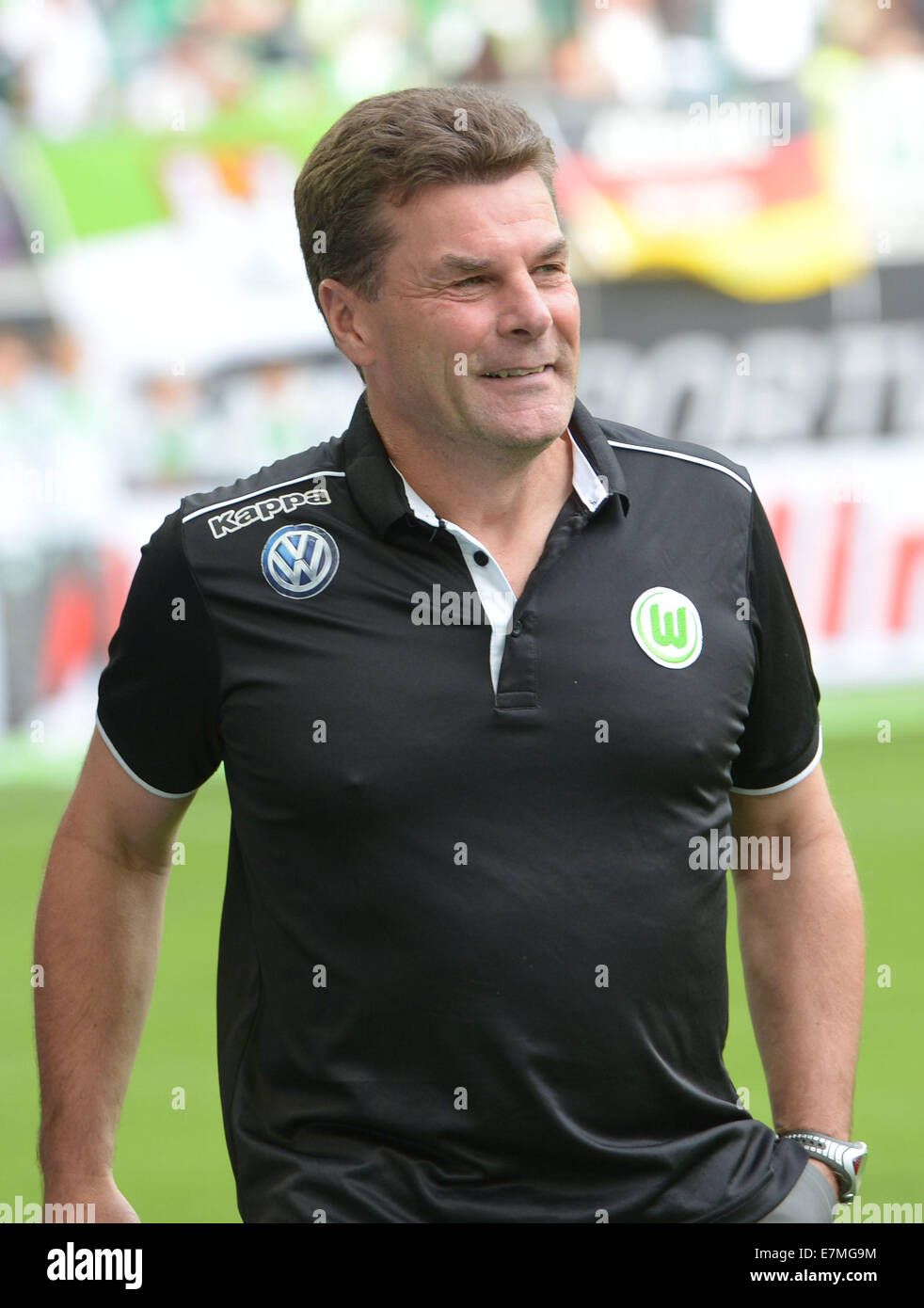 Wolfsburg's coach Dieter Hecking walks through the arena before the ...