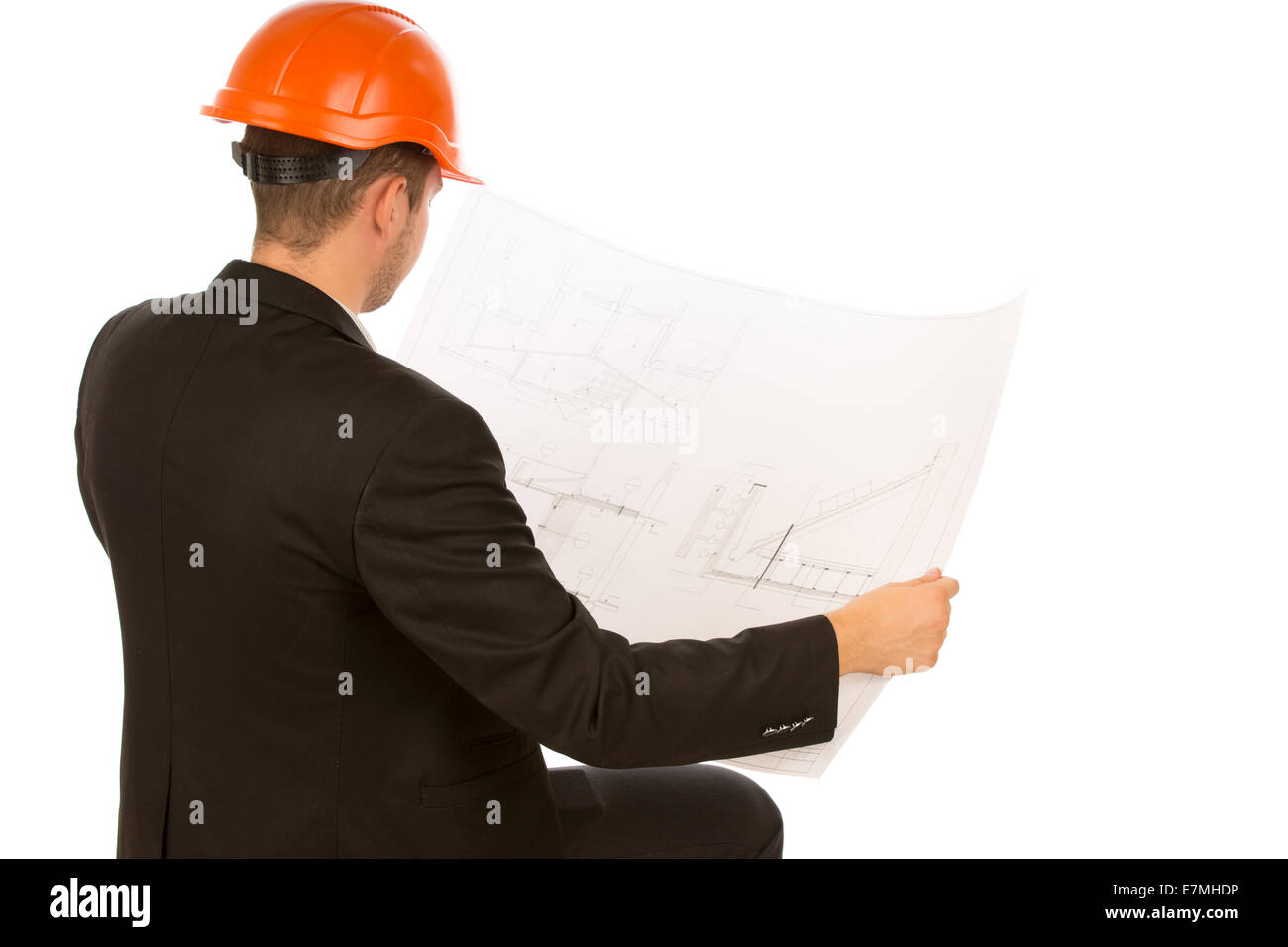 Sitting Male Engineer in Black Coat Looking at Blueprint Design on ...