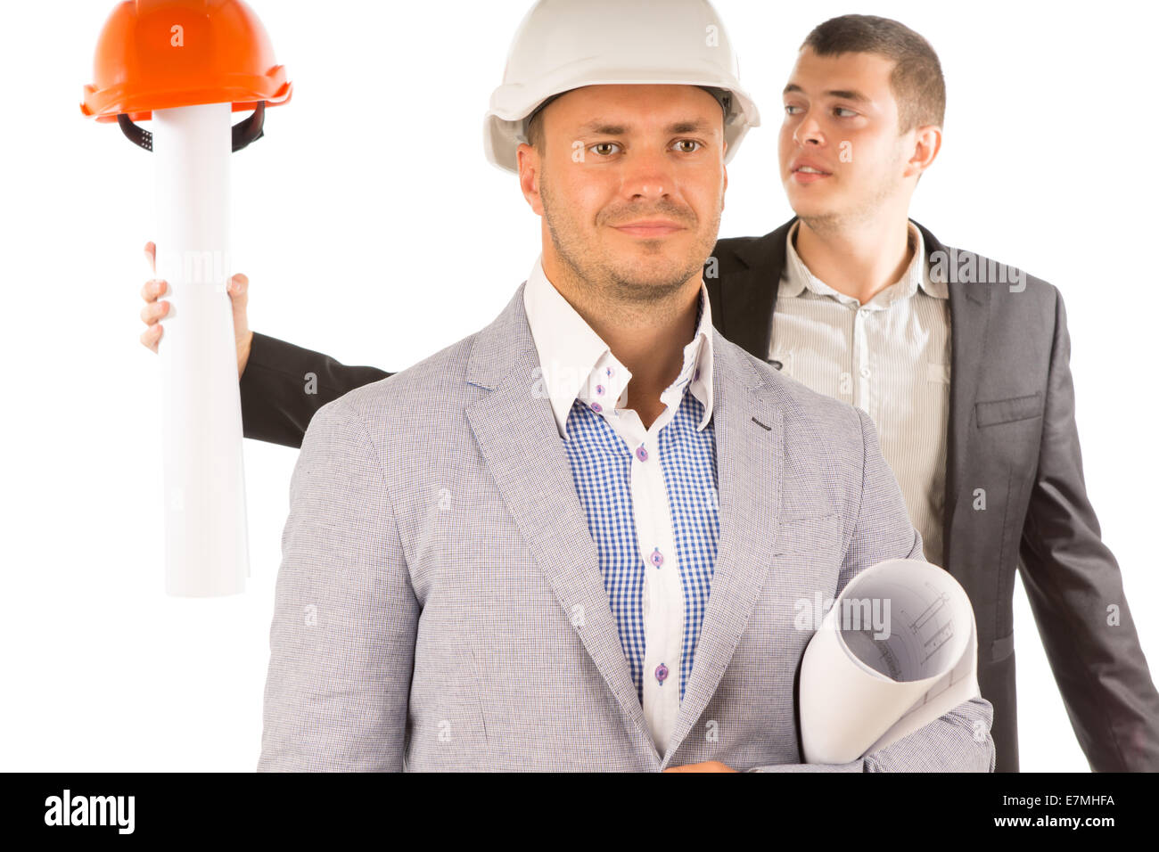 Close up Middle Age Male Engineers. One is in Gray Coat with White ...