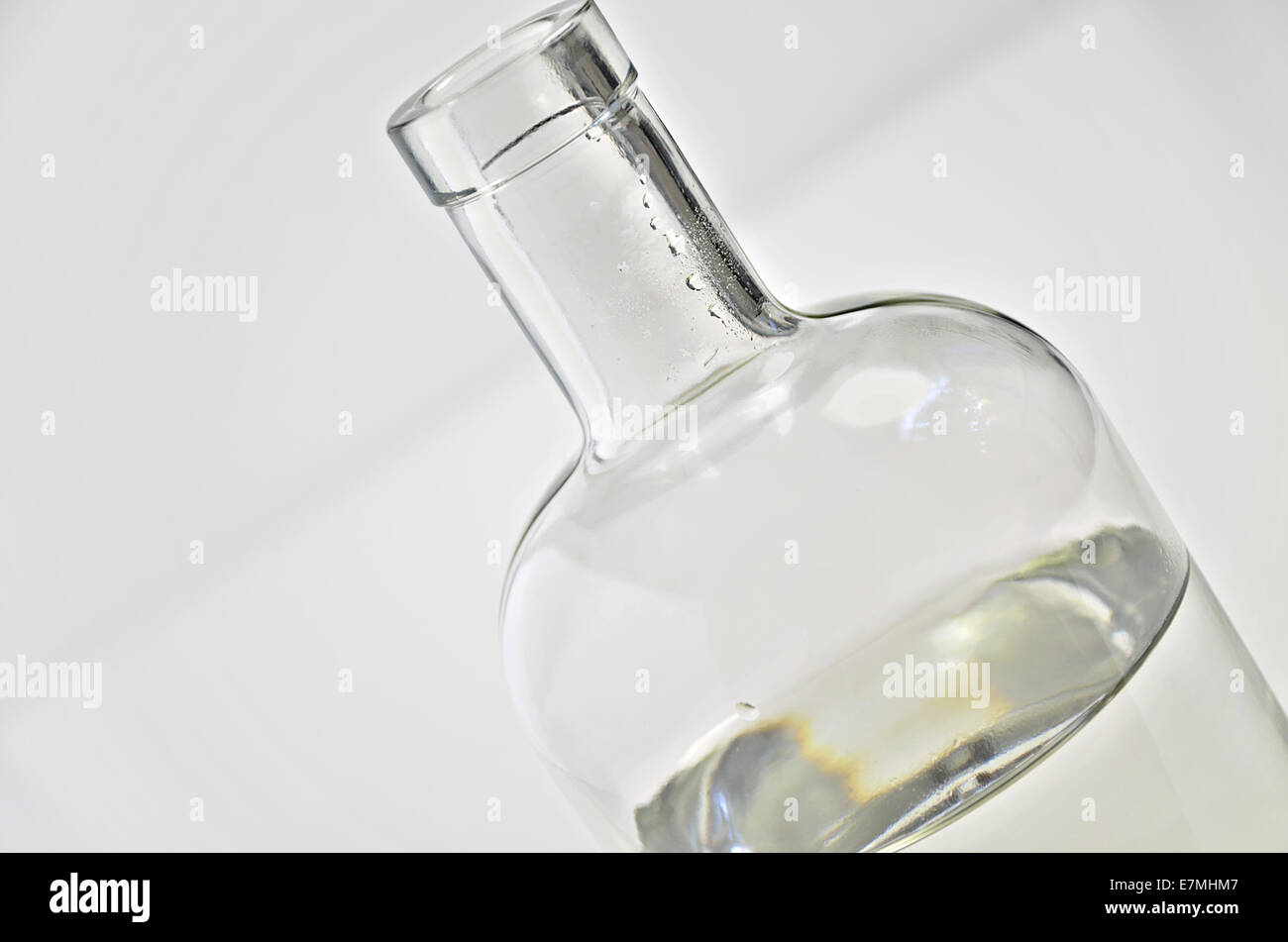 bottle with booze, macro, close up, full frame, white background ...