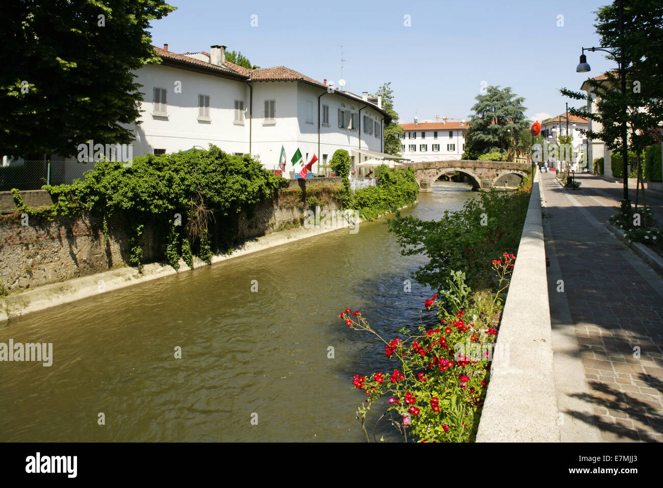 Medieval arched stone bridge across the River Lambro, Monza, Italy ...