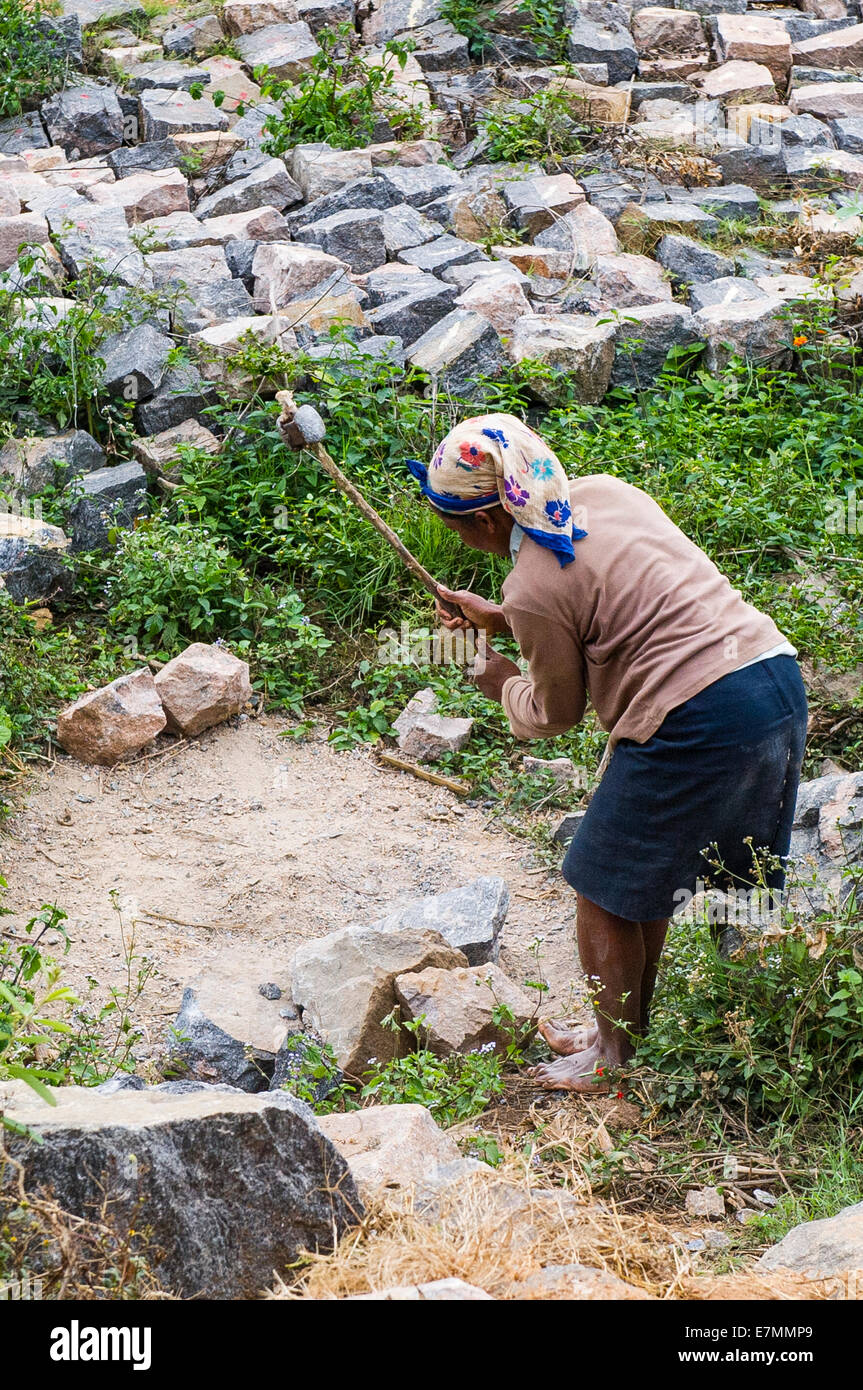 Breaking rocks hi-res stock photography and images - Alamy