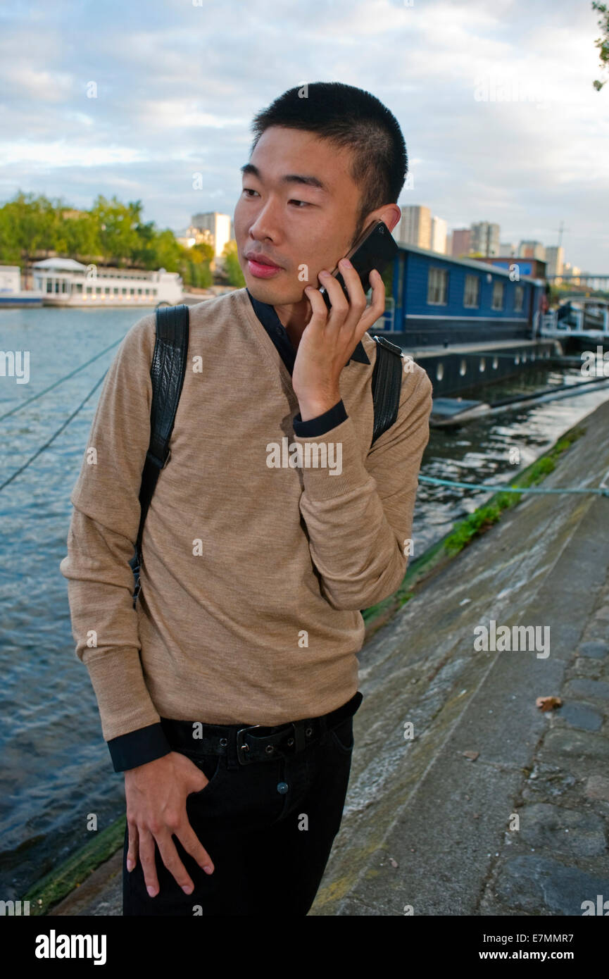 Young chinese man standing outside hi-res stock photography and images ...
