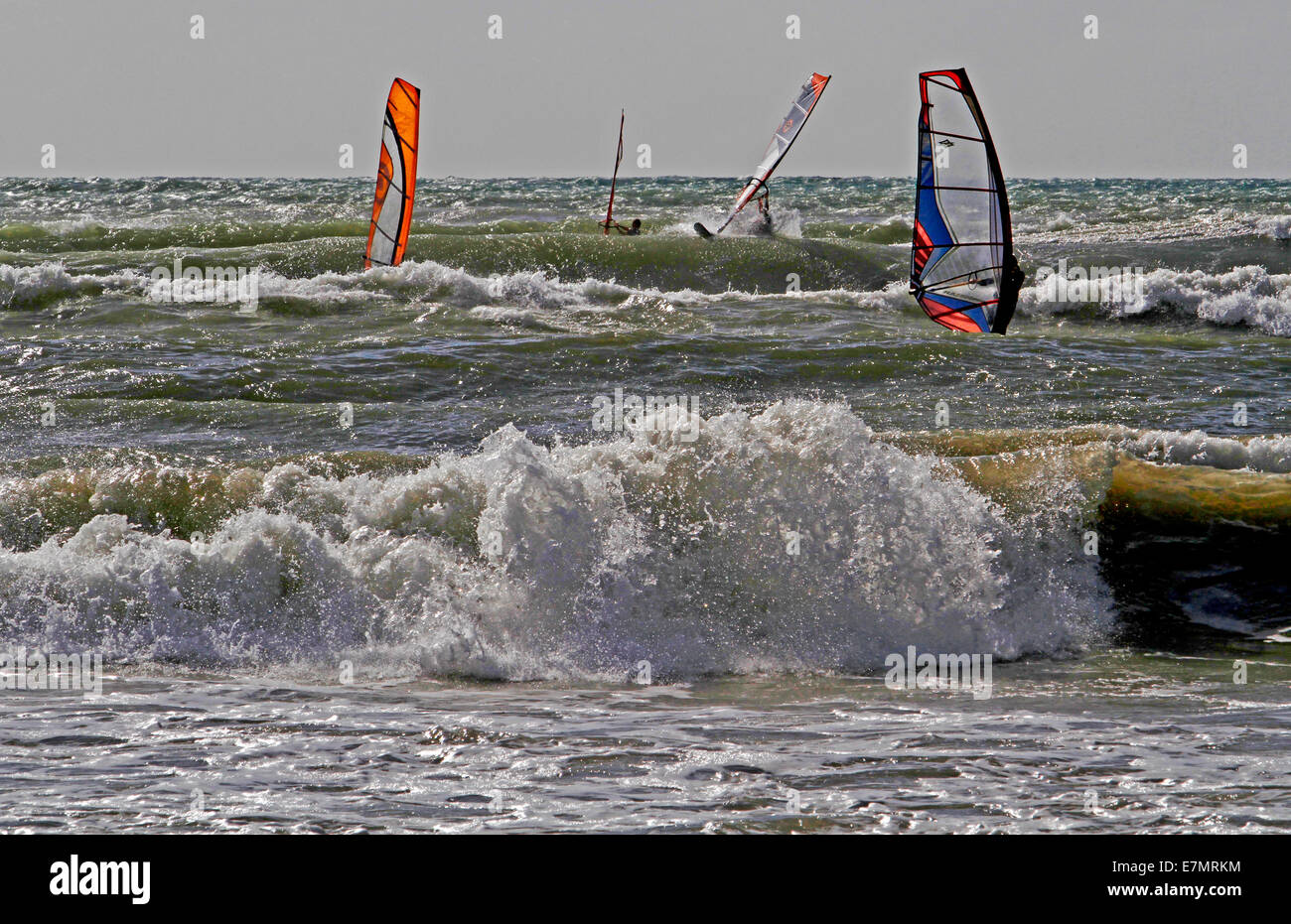 People practices windsurfing and kite surfing in El Arenal beach in ...