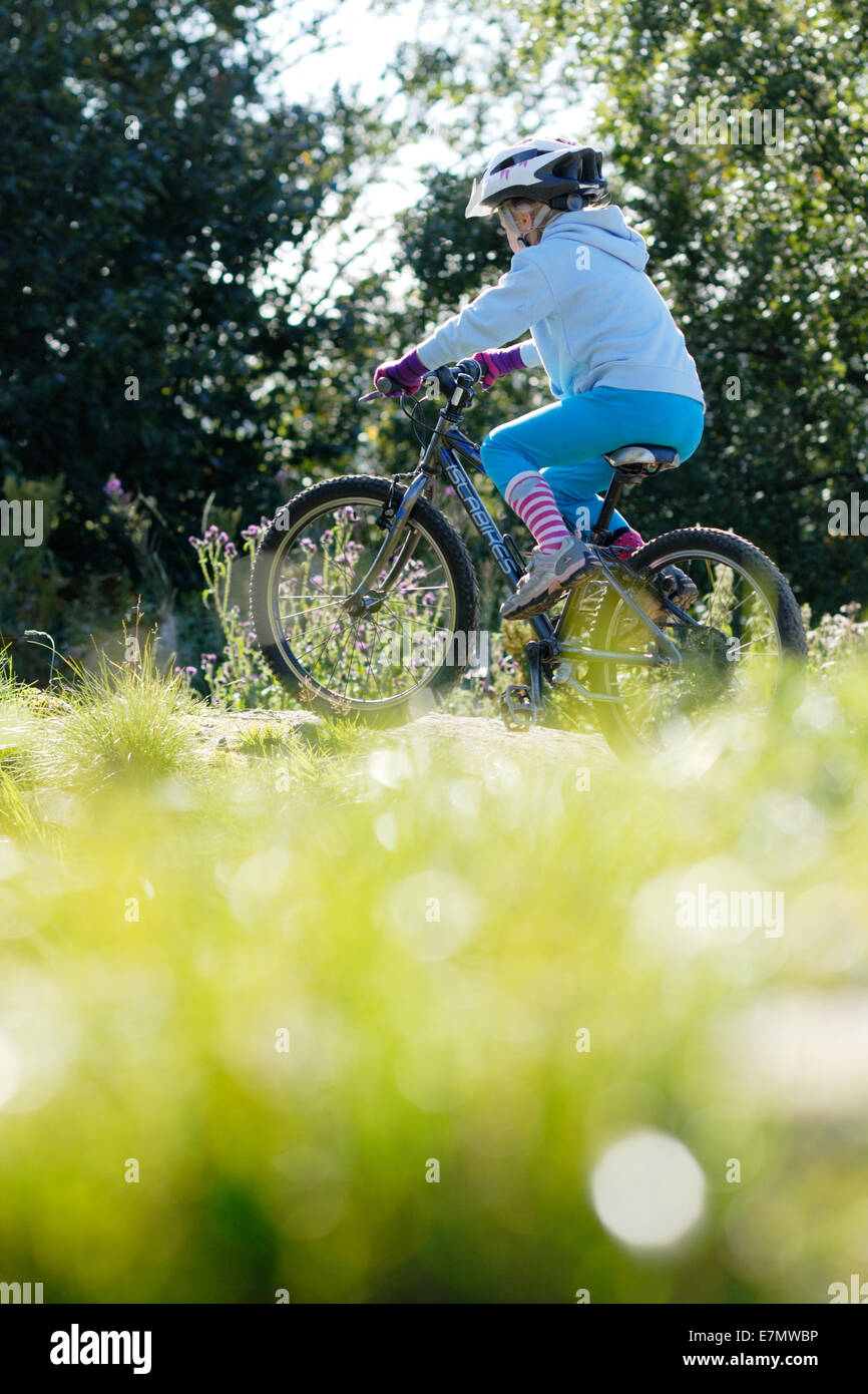 Child riding a bike Stock Photo - Alamy