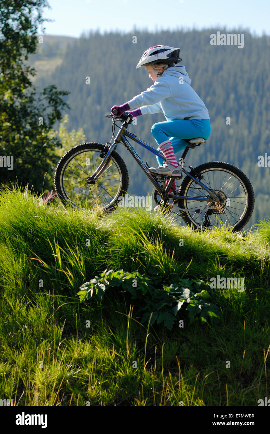 Child riding a bike Stock Photo - Alamy