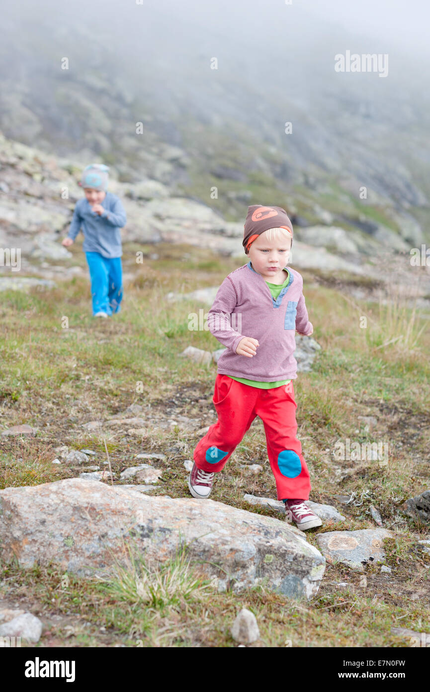Two boys walking outside hi-res stock photography and images - Alamy
