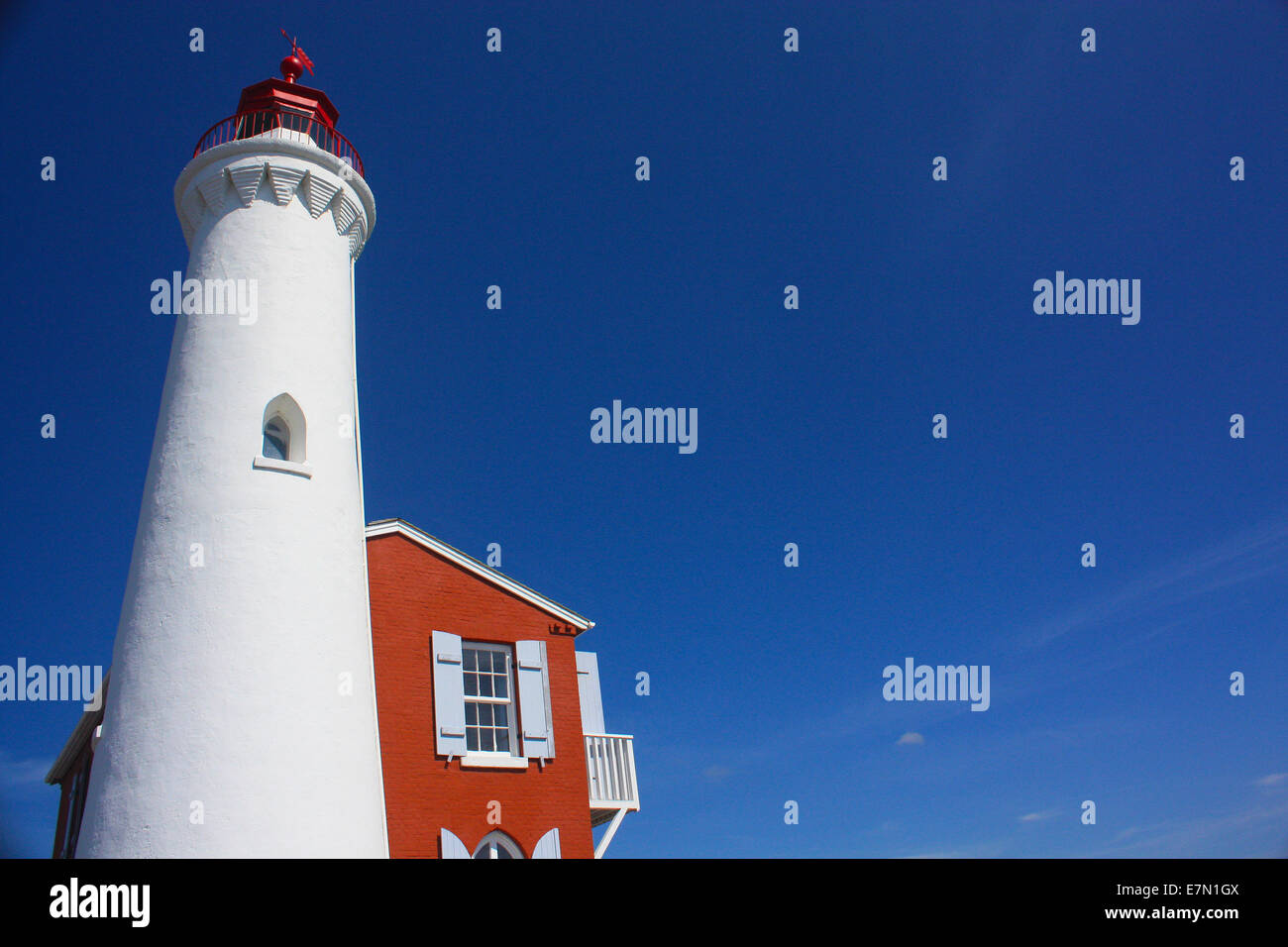 Red and White Lighthouse against Summer Clear Blue Sky Stock Photo - Alamy
