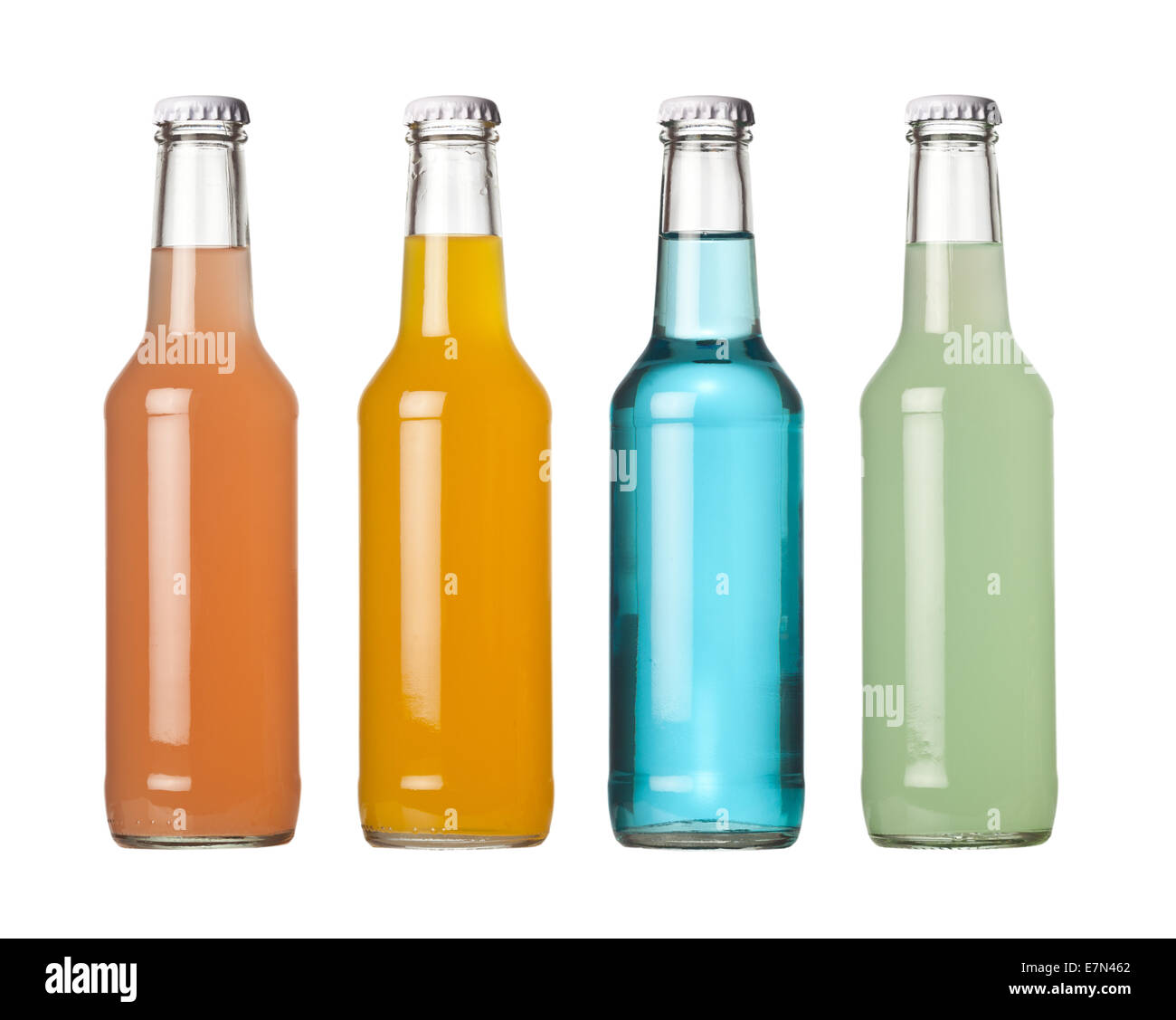 Four bottles of different colored soda isolated on white background ...