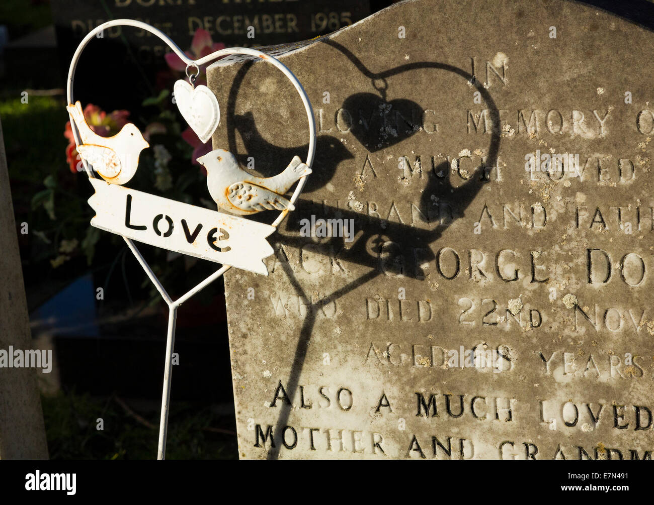 gravestone with a sign saying 'Love' Stock Photo - Alamy