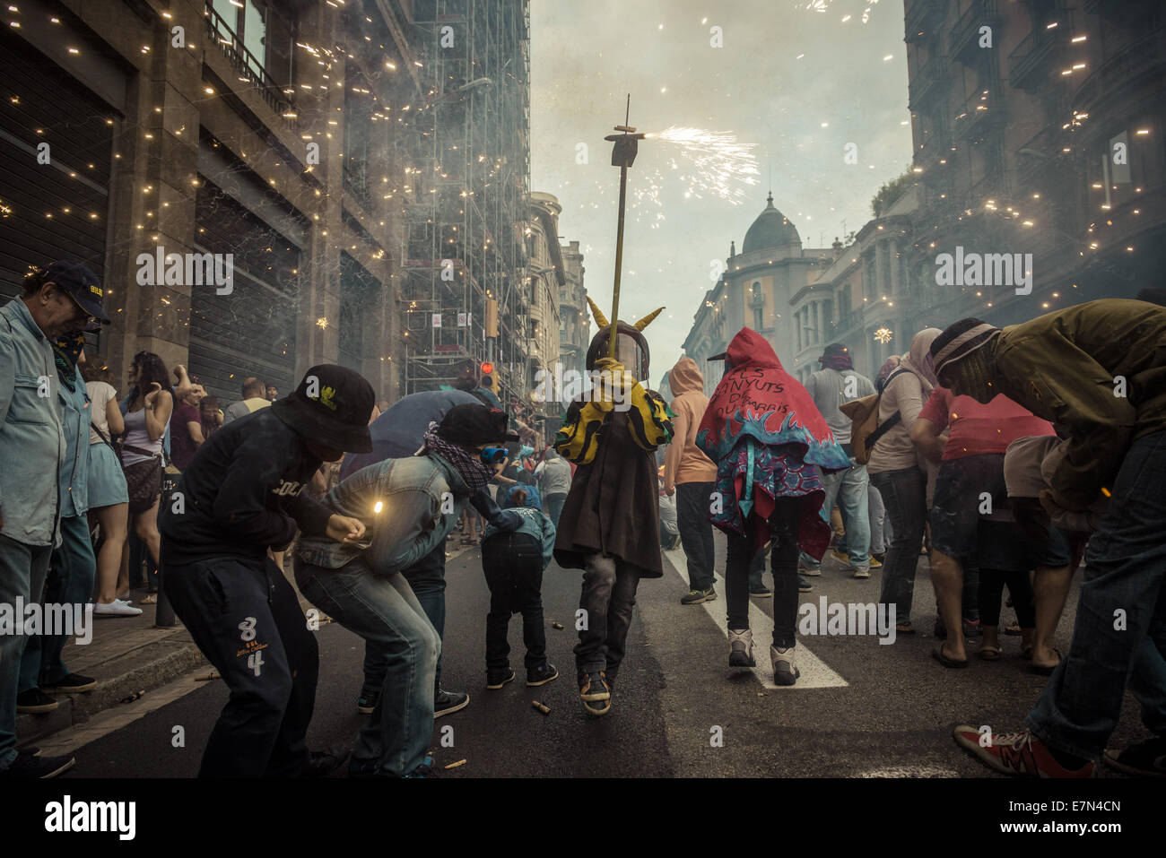 Sept. 21, 2014 - Children in devil costumes dance to traditional drums ...