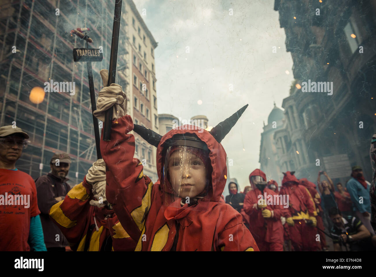 Sept. 21, 2014 - Children in devil costumes dance to traditional drums ...