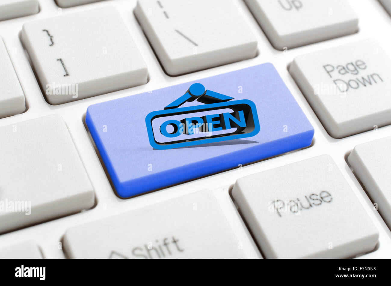 Blue open sign on keyboard Stock Photo - Alamy