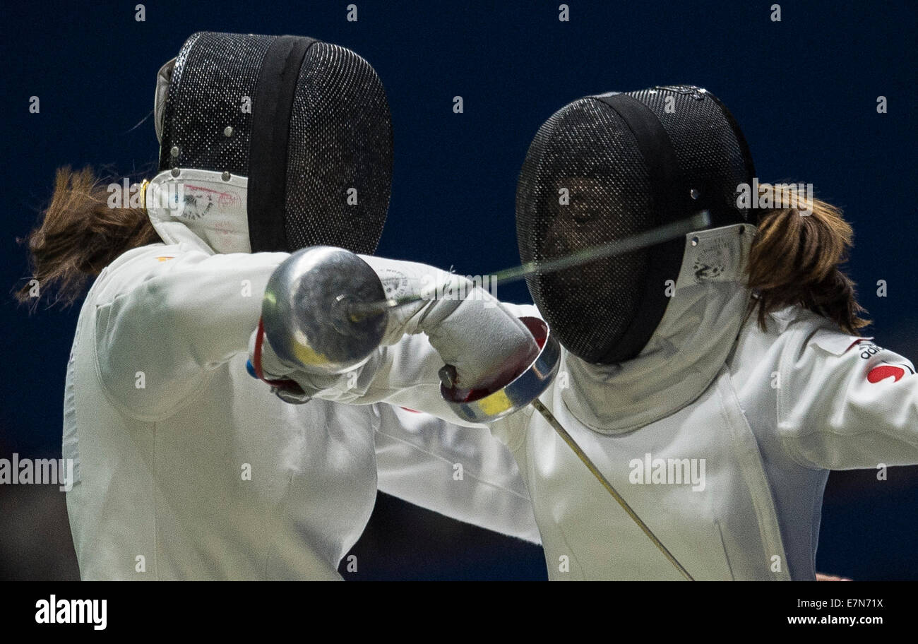 Incheon, South Korea. 22nd Sep, 2014. Shin Alam (R) of South Korea ...