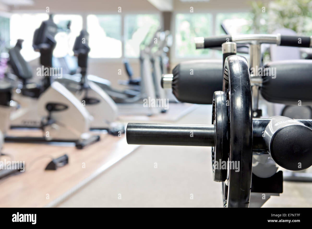 diverse equipment and machines at the gym room Stock Photo - Alamy