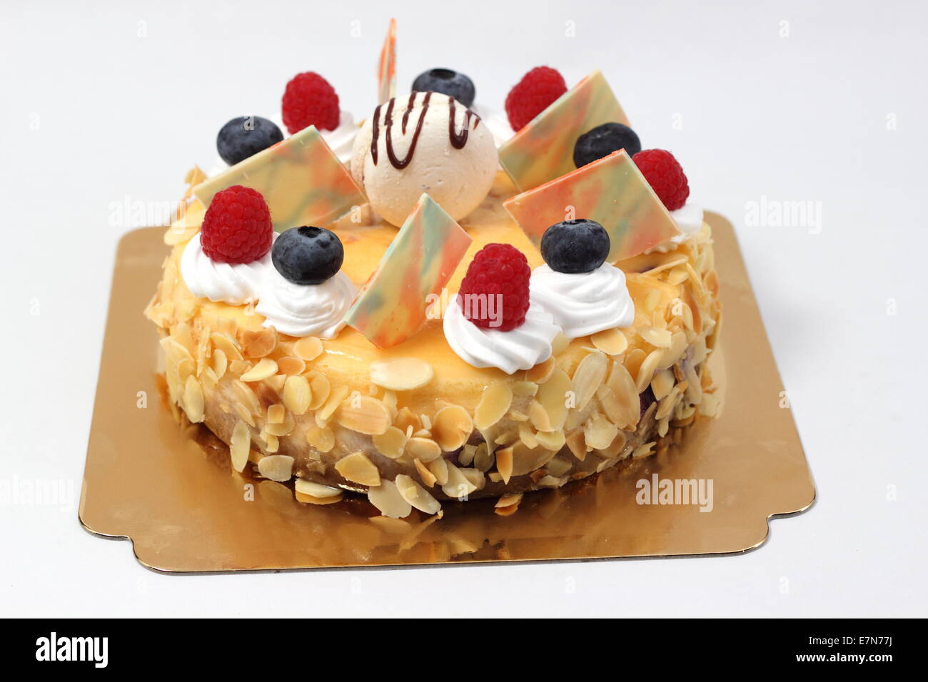 A Delicious cheese cake with fruit toping Stock Photo - Alamy