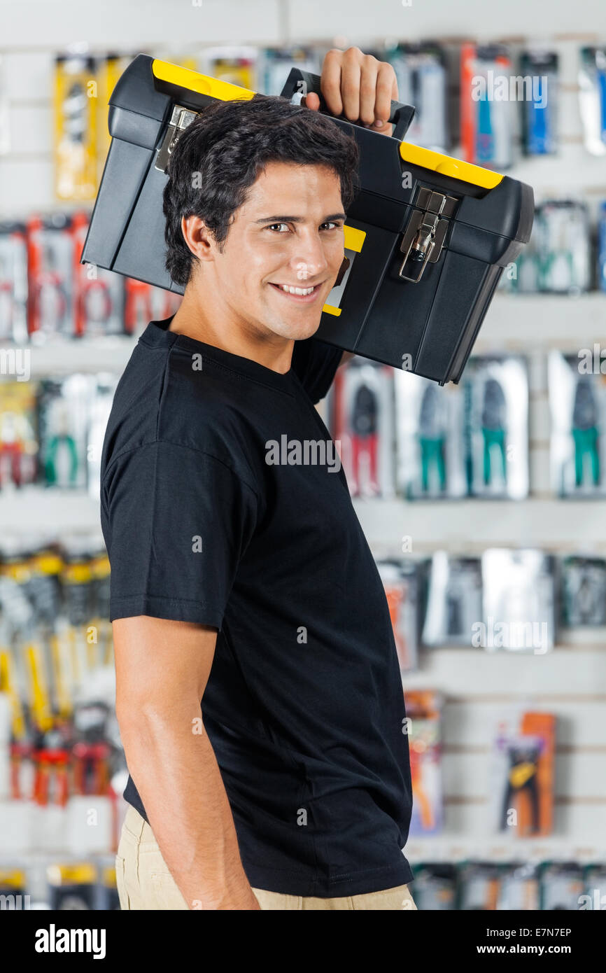 Man carrying tool box on hi-res stock photography and images - Alamy