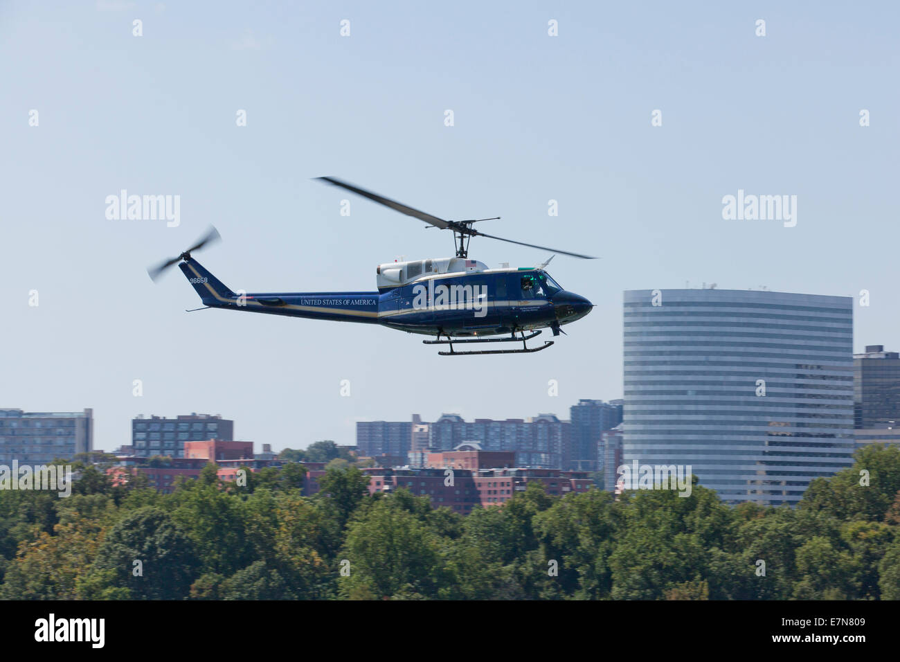 USAF Space Command Bell UH-1N Twin Huey helicopter flying low ...
