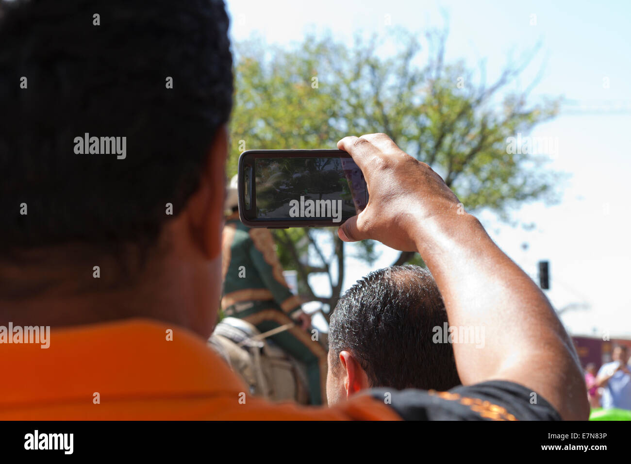 Man video taping mobile phone hi-res stock photography and images - Alamy