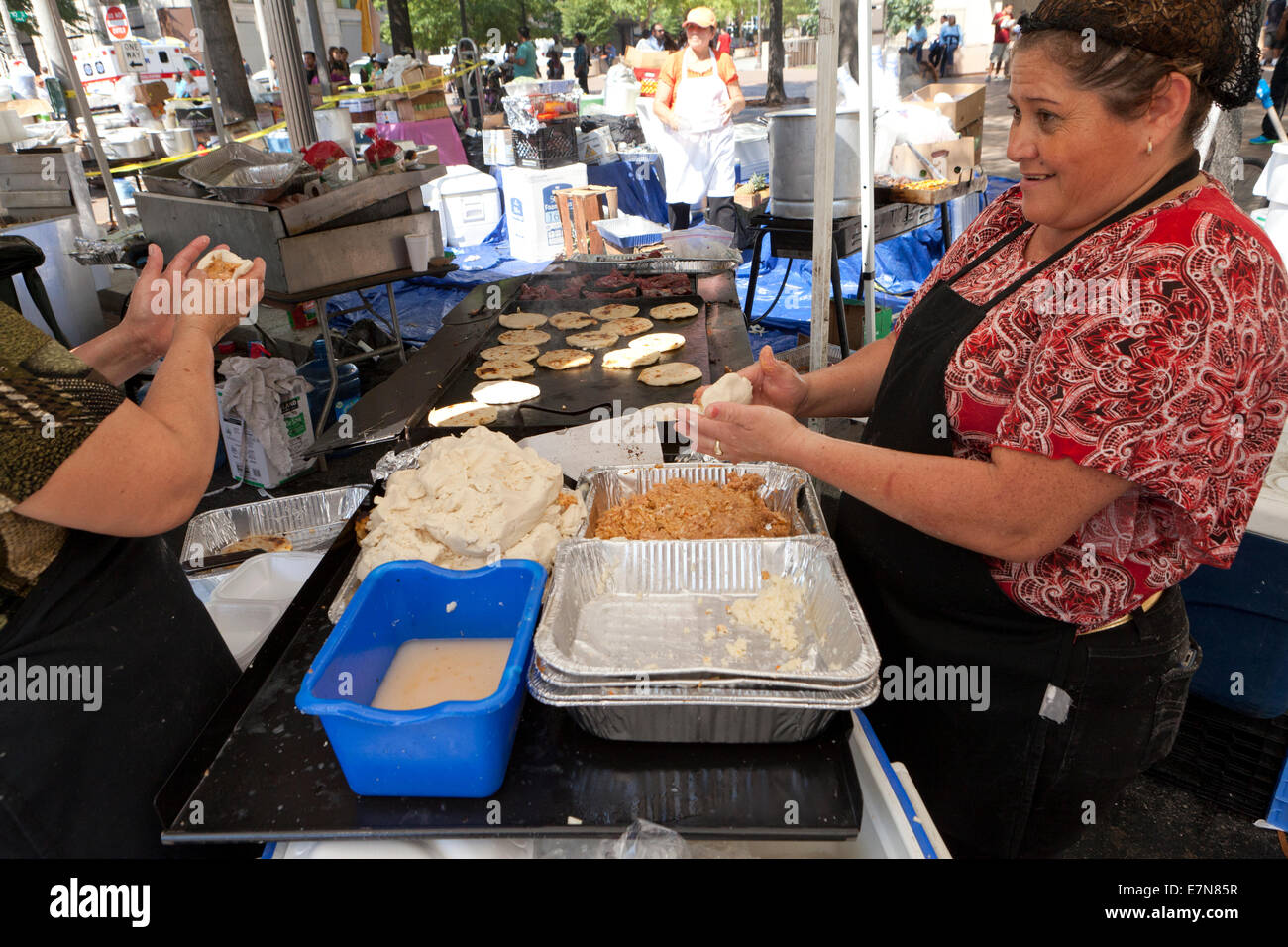 Women making pupusas at an outdoor festival - USA Stock Photo - Alamy