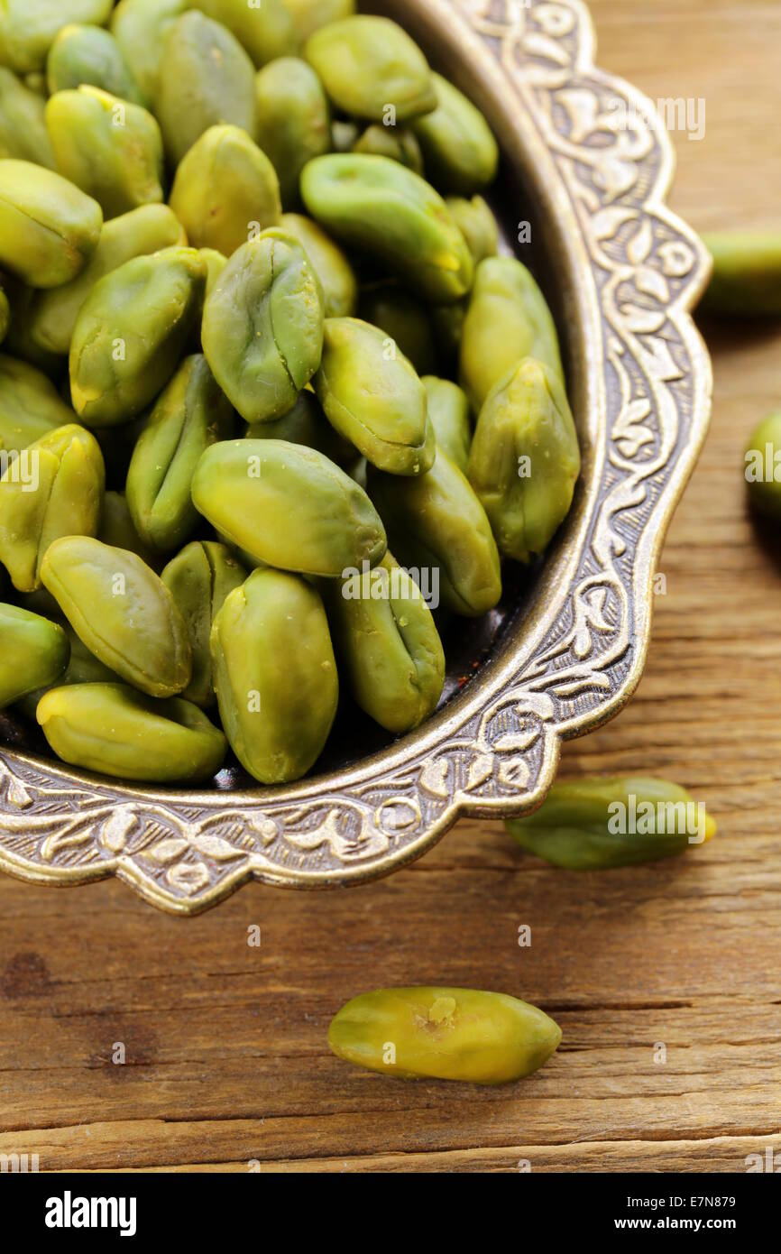 Peeled green pistachio nuts on hi-res stock photography and images - Alamy