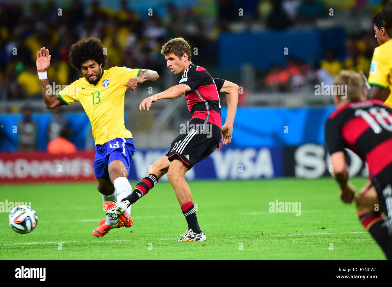 Dante and Thomas Mueller Muller. Brazil v Germany. Semi-final FIFA ...