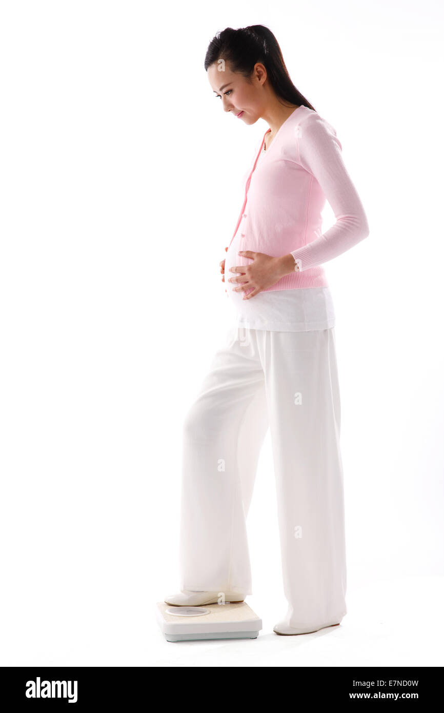 Measuring pregnant belly Cut Out Stock Images & Pictures - Alamy