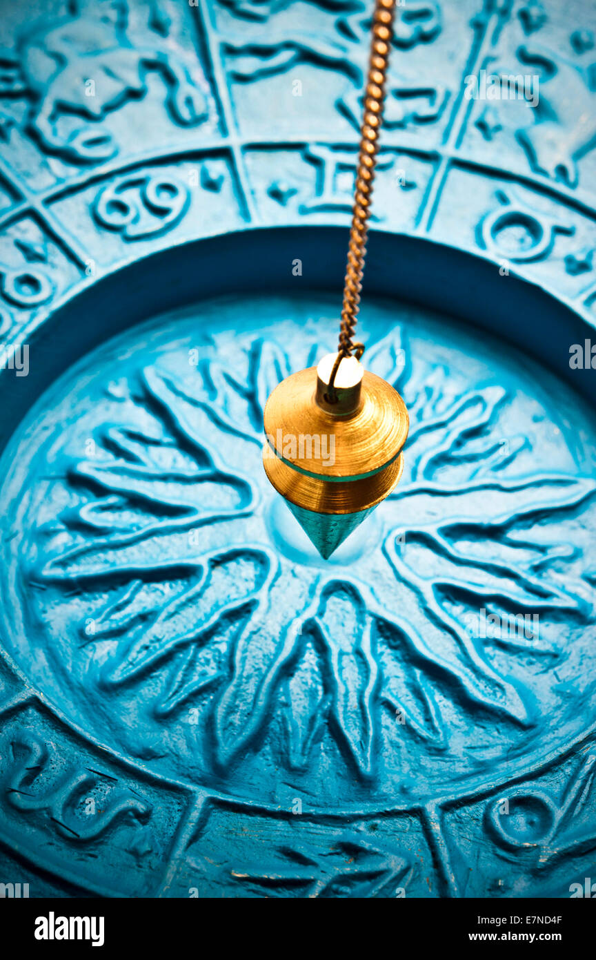 astrology and pendulum Stock Photo - Alamy
