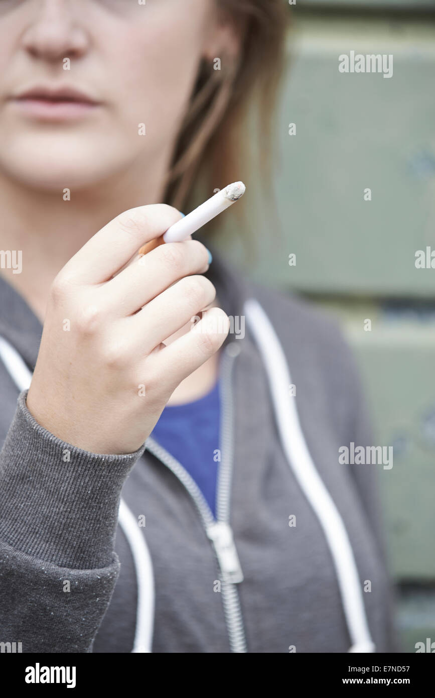 Close Up Of Teenage Girl Smoking Cigarette Stock Photo - Alamy
