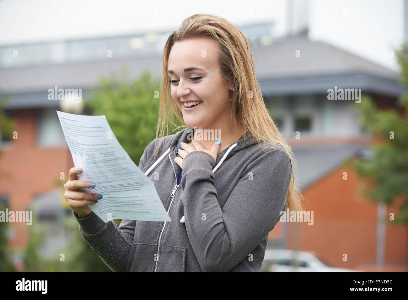 Education smiling exam results hi-res stock photography and images - Alamy