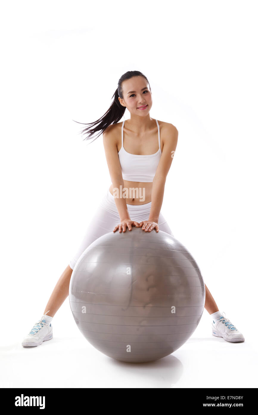 Young woman on exercise Stock Photo - Alamy