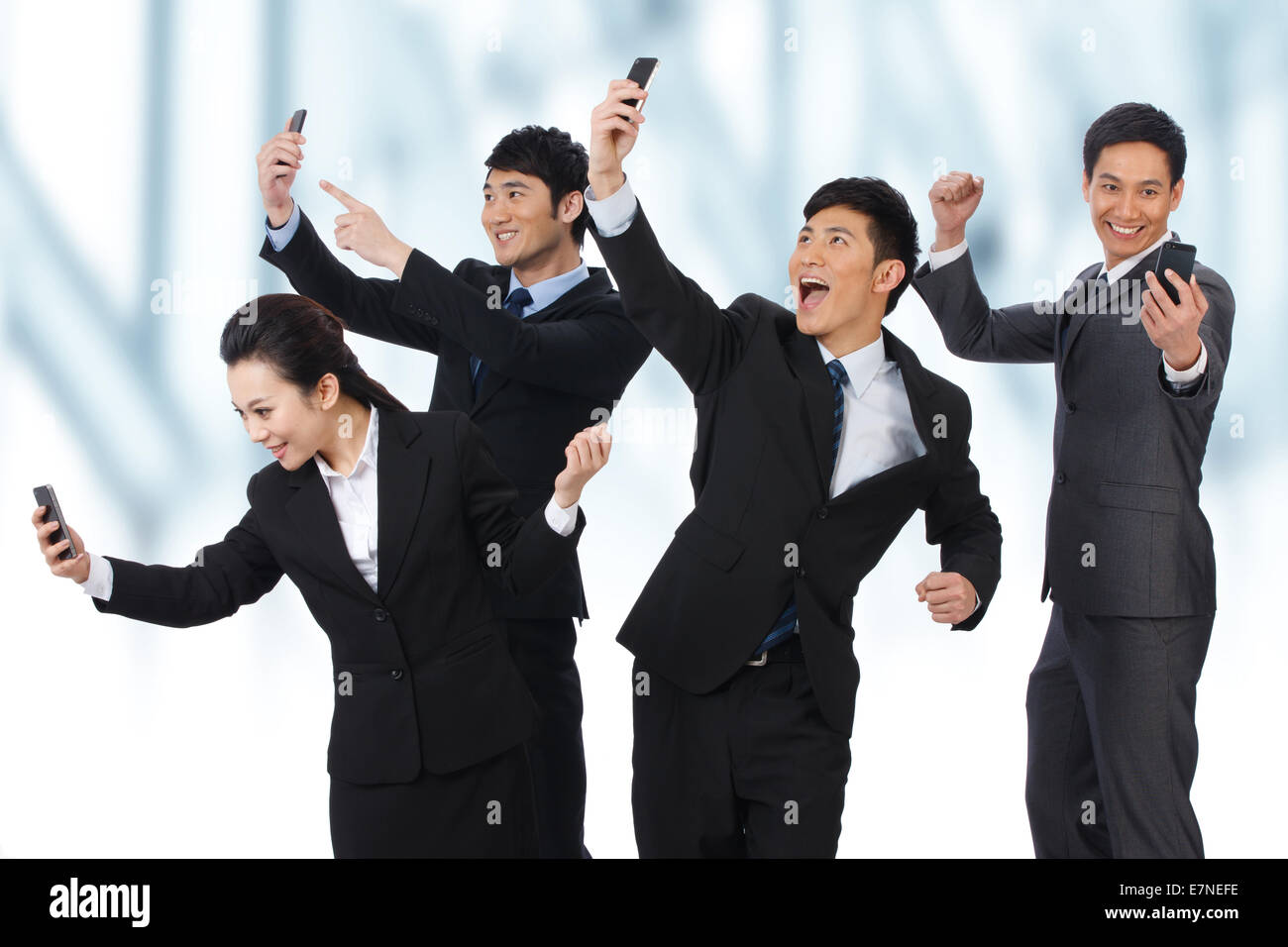 Business people using cell phones Stock Photo - Alamy